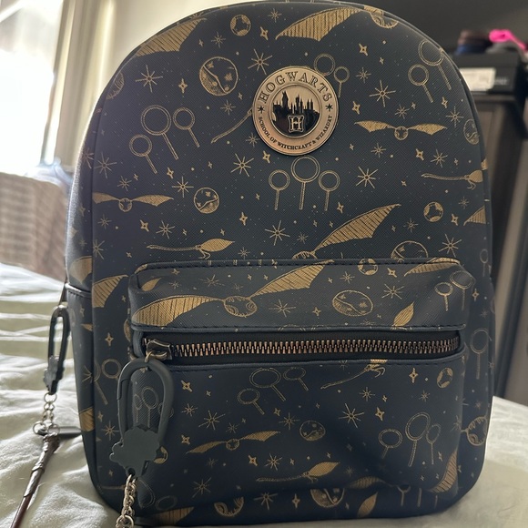 Bioworld | Bags | Gold And Navy Blue Harry Potter Mini Backpack With ...